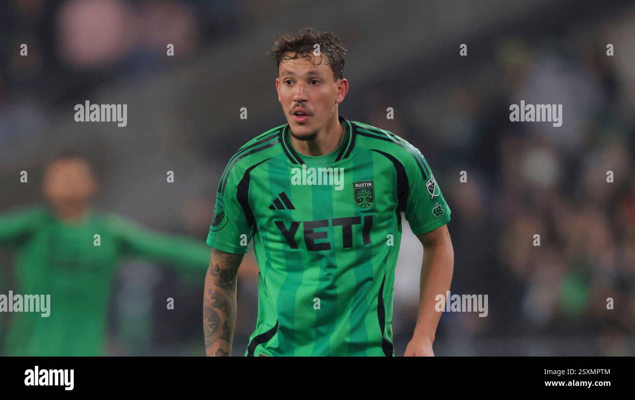 Austin FC defender Guilherme Biro (29) competes against Sporting Kansas ...