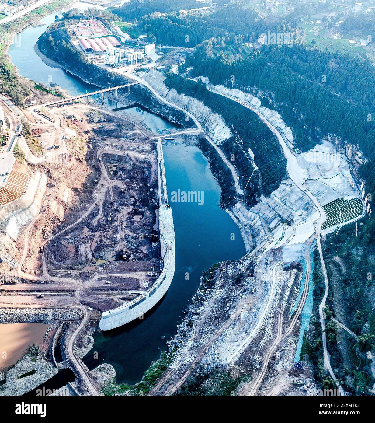 Workers work at the construction site of Qingyukou Reservoir in ...