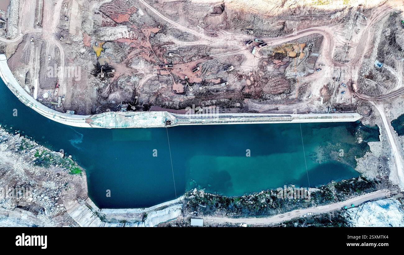 Workers work at the construction site of Qingyukou Reservoir in ...