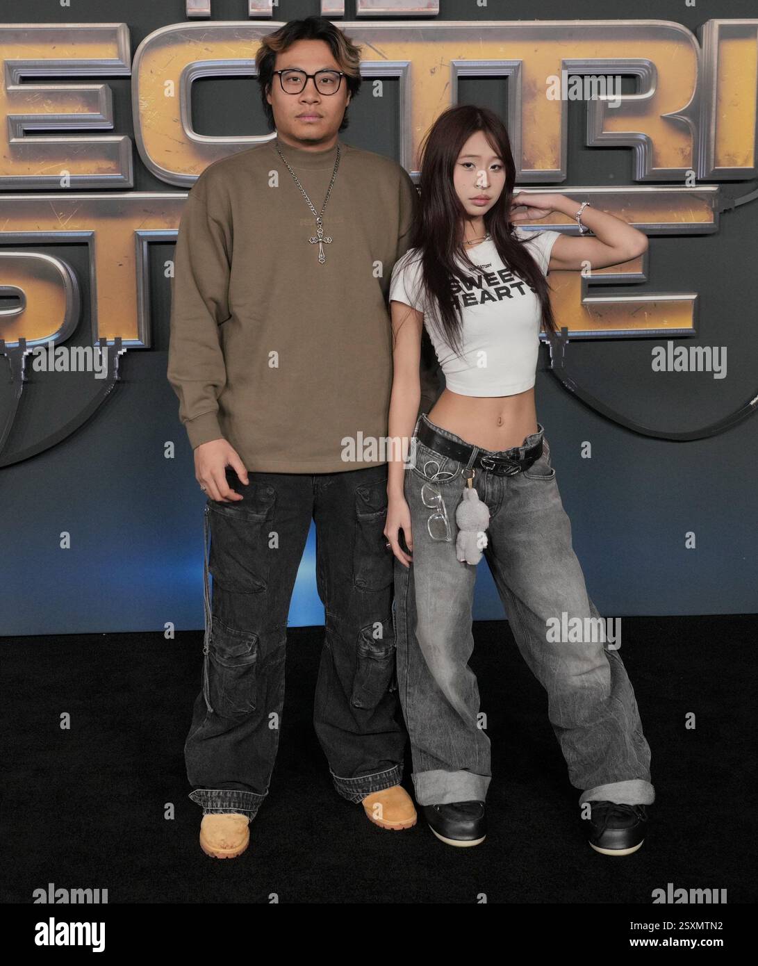 Los Angeles, USA. 24th Feb, 2025. Thomas Wu and Amelia Wu arrives at Netflix's THE ELECTRIC ...