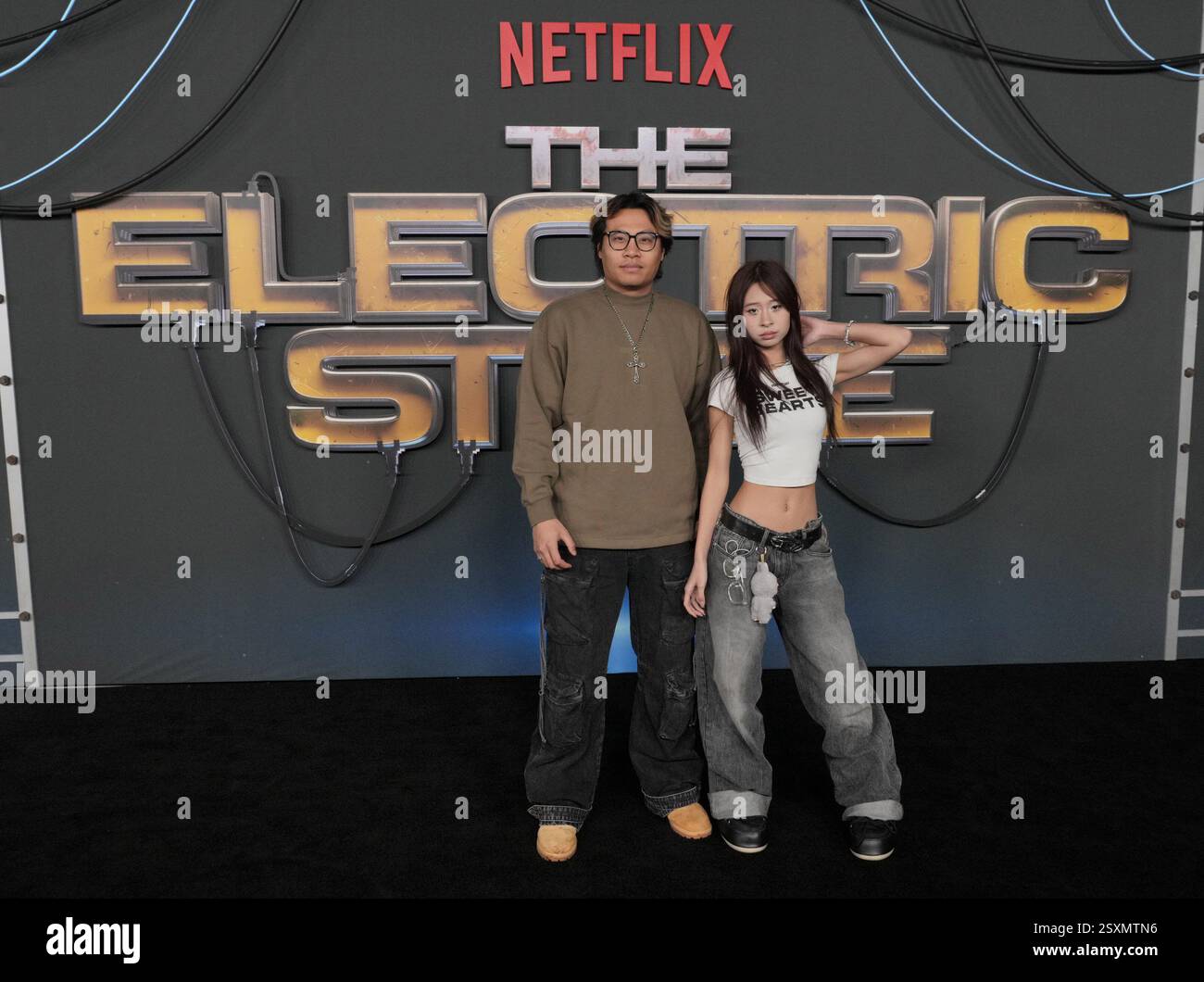Los Angeles, USA. 24th Feb, 2025. Thomas Wu and Amelia Wu arrives at ...