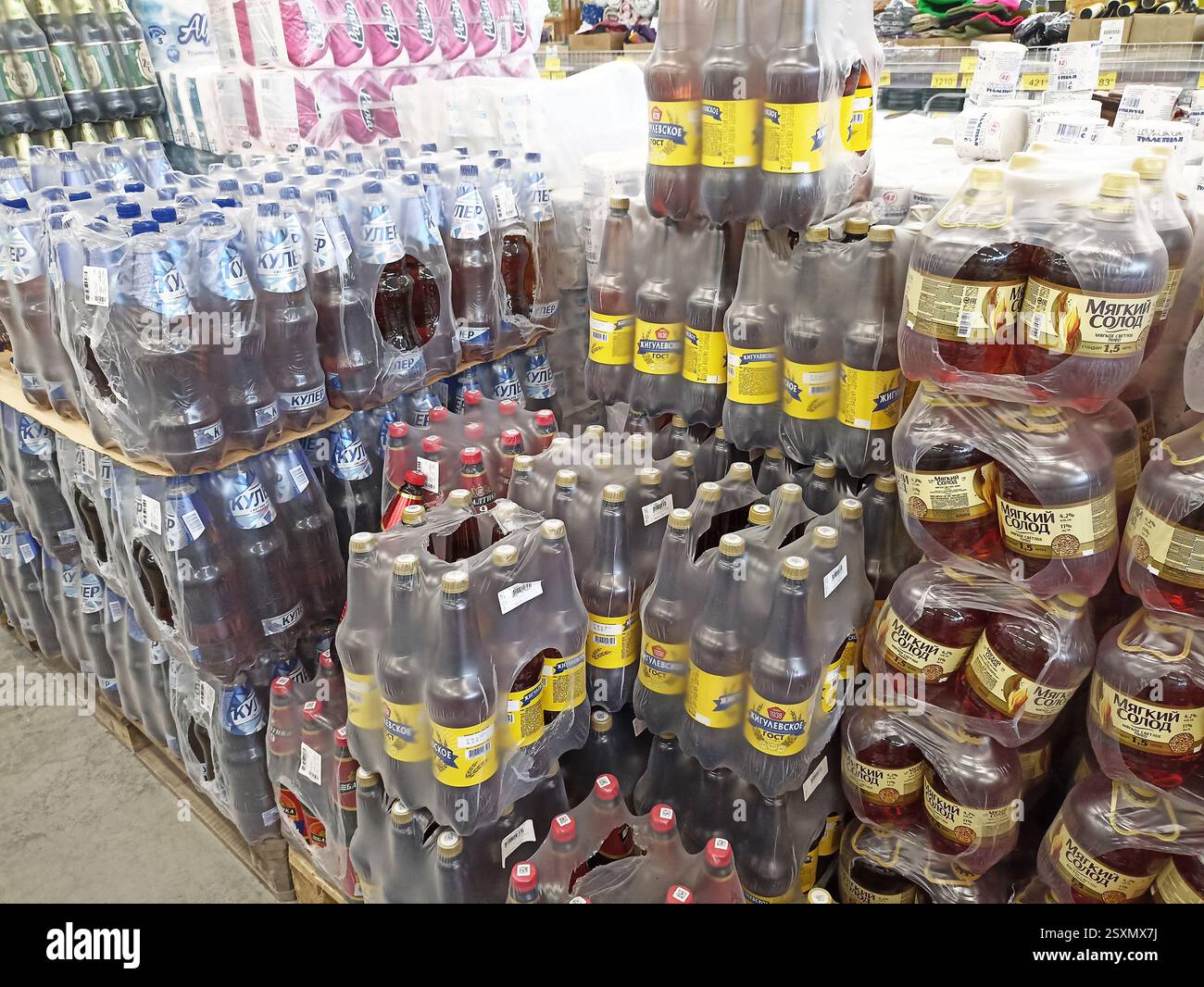 Assorted beverage bottles displayed in retail store aisle Stock Photo ...