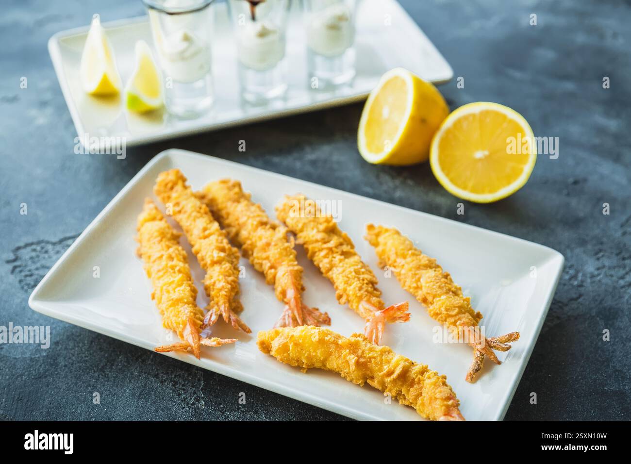 Grilled king shrimps served with sauce. Delicious sea food in ...