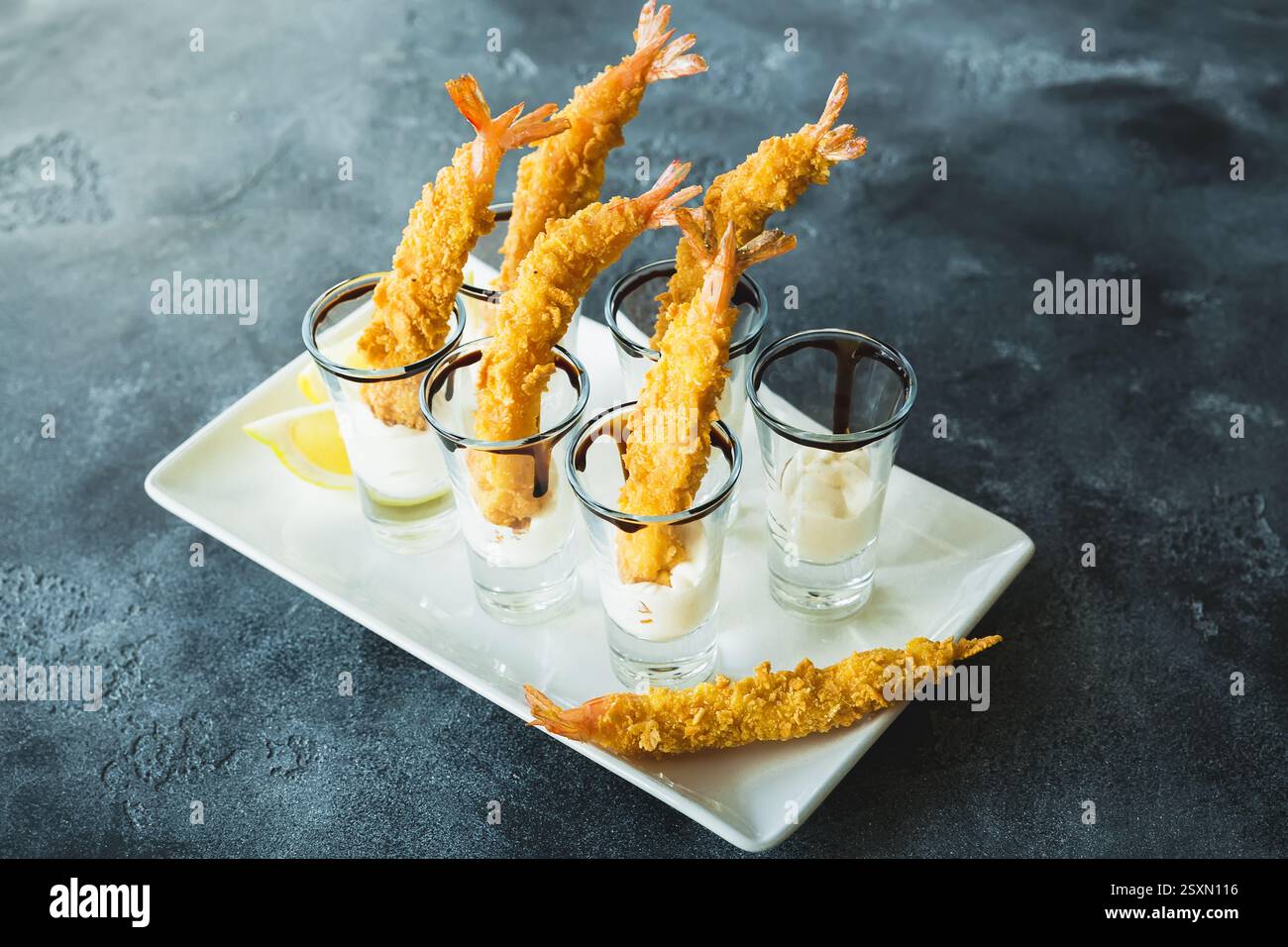 Grilled king shrimps served with sauce. Sea food in restaurant Stock ...
