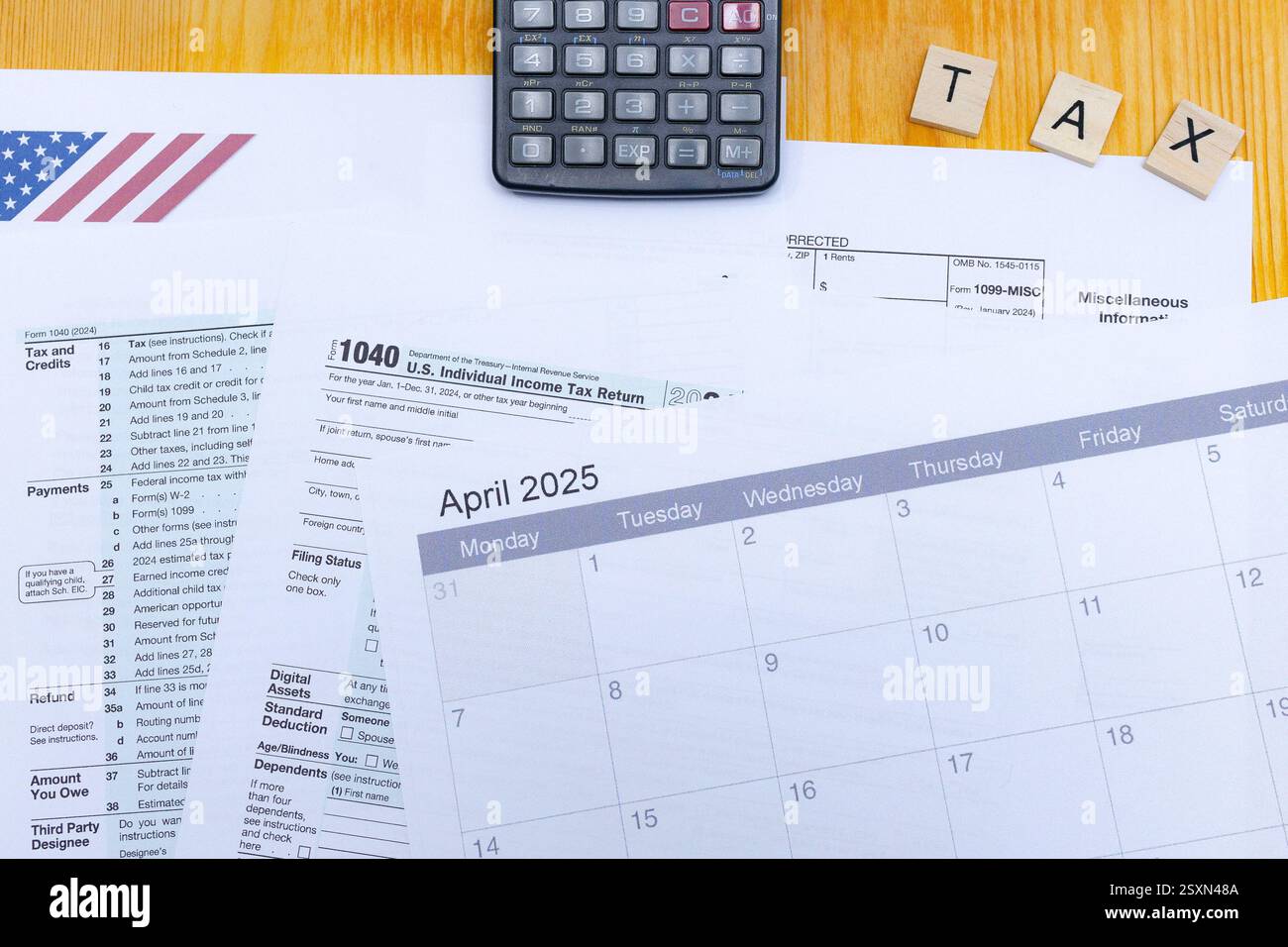 Financial planning with U.S. tax documents, including 1040 and 1099 ...