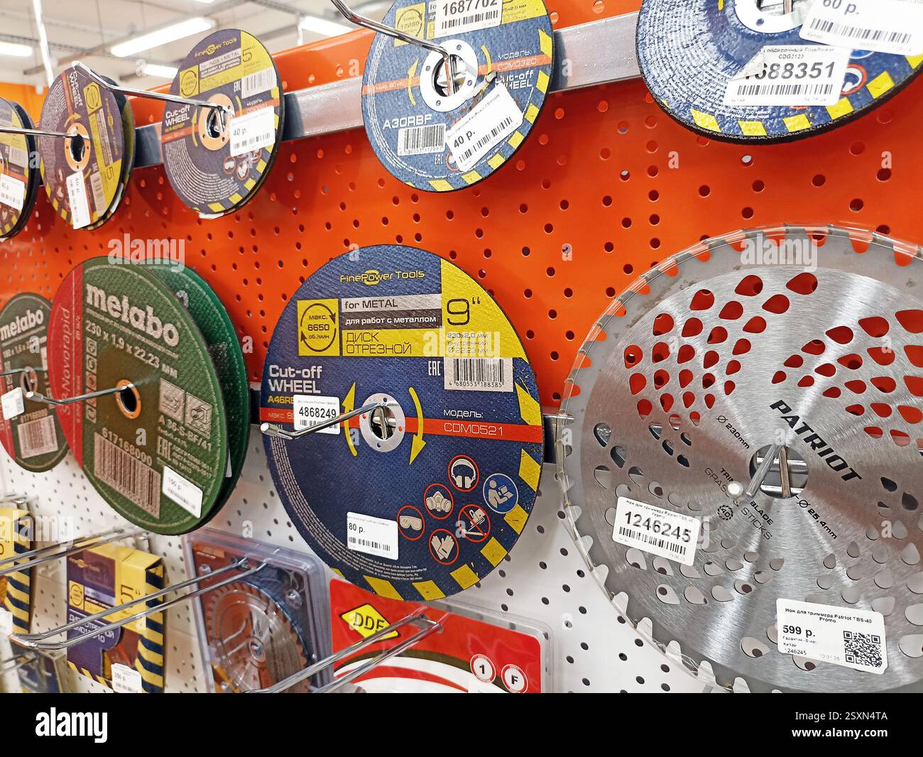Assorted industrial cutting discs on hardware store display Stock Photo ...