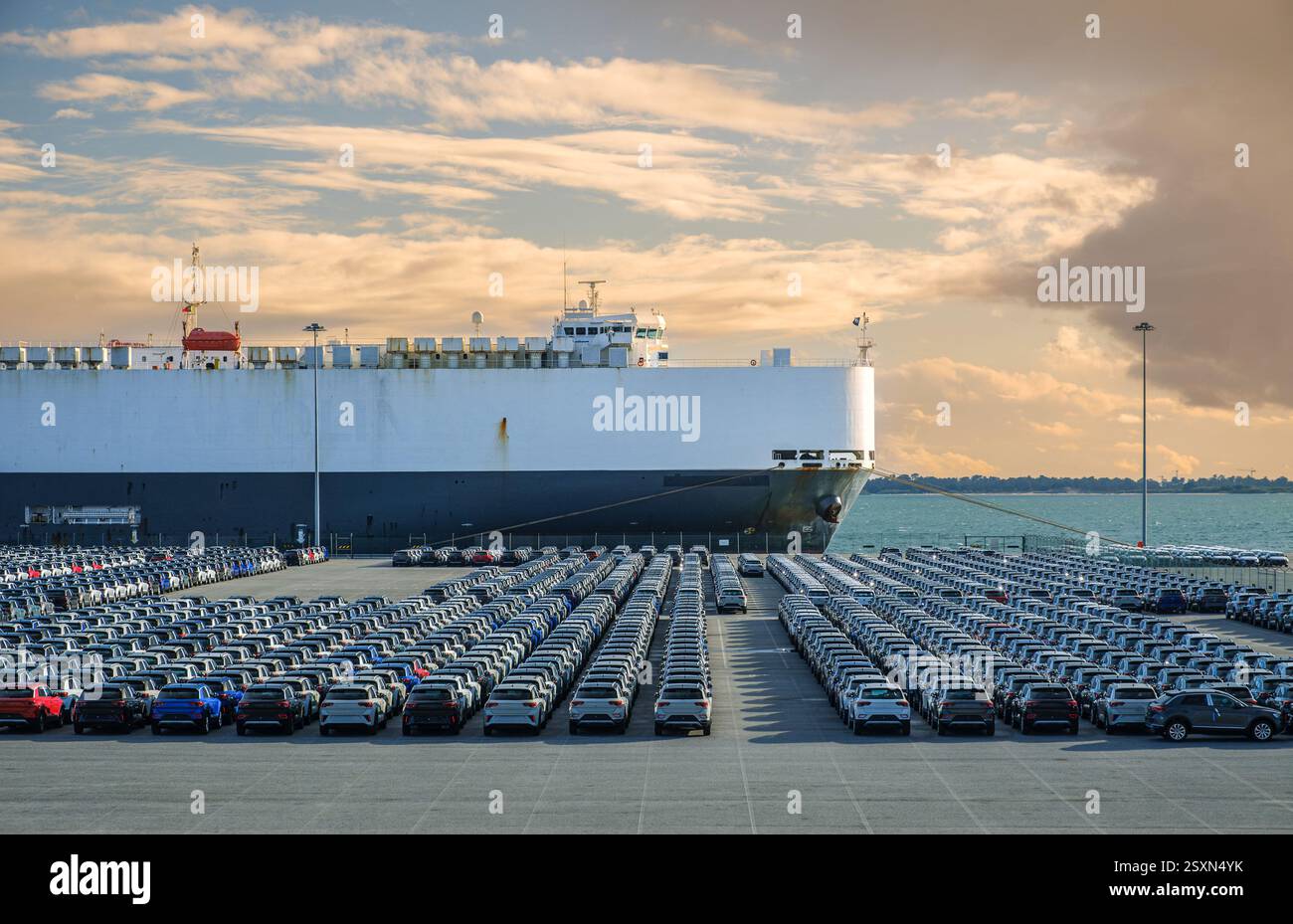 Large vehicle carrier ship known as RO-RO at port on sunny day, large ...