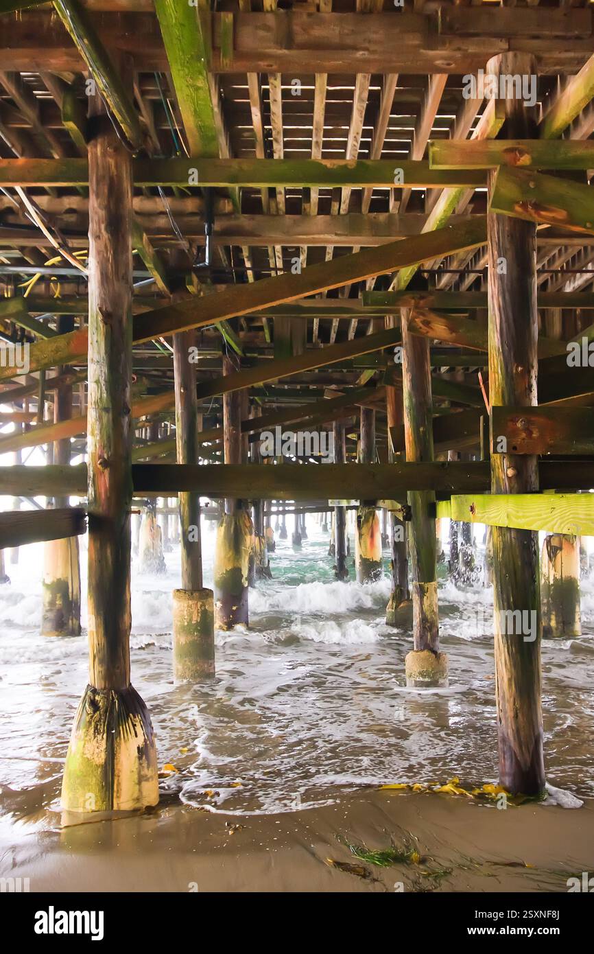 Waves crashing against dock in hi-res stock photography and images - Alamy
