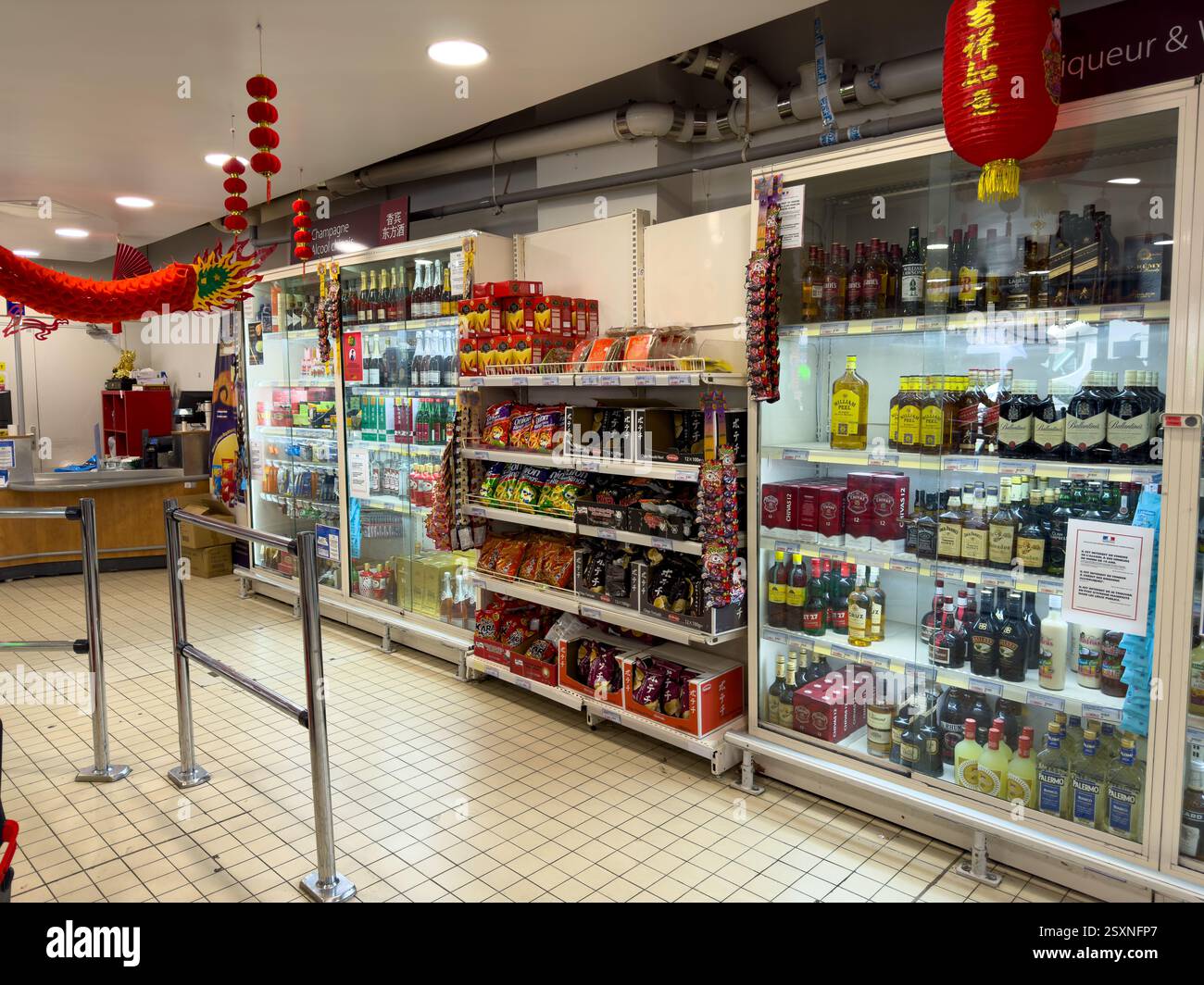 Variety of beverages and snacks displayed in a vibrant convenience ...