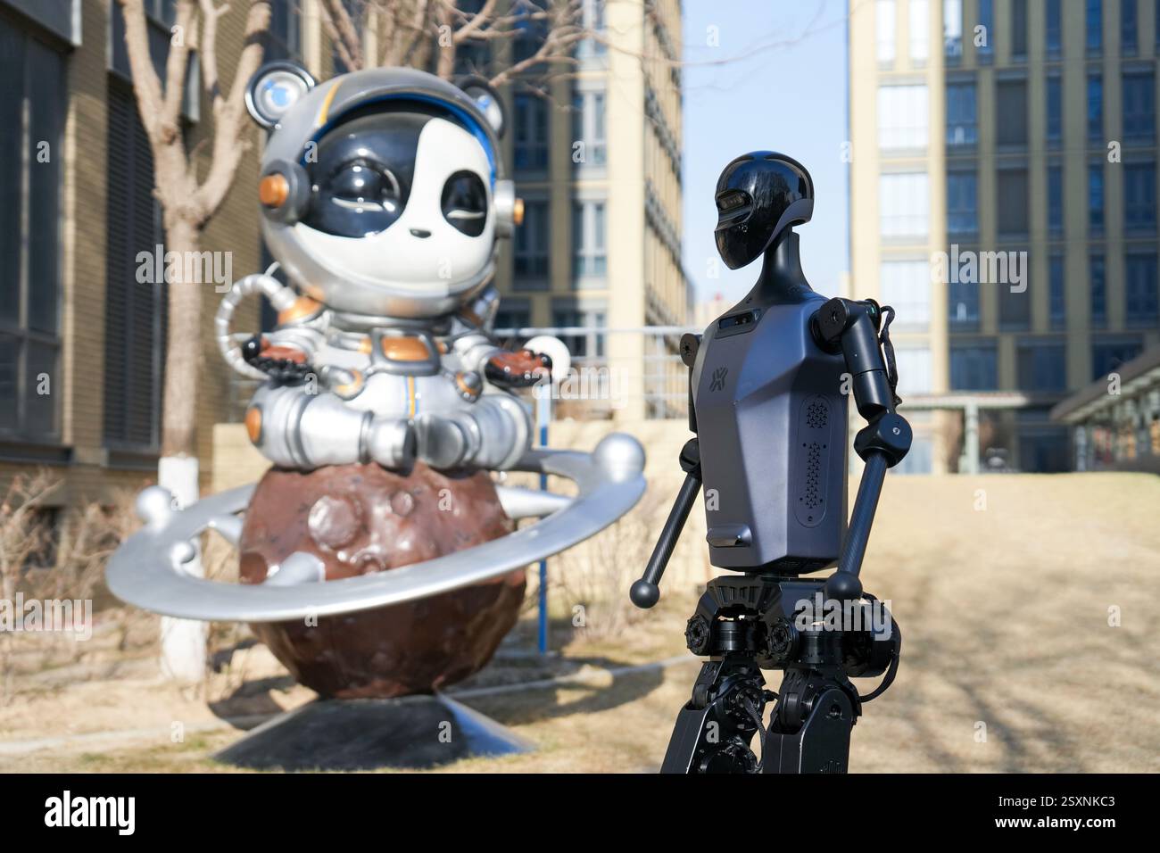Beijing, China. 24th Feb, 2025. A "Tiangong" humanoid robot displays ...
