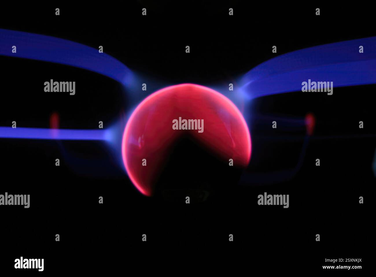 Pink and blue plasma filaments extending from a central sphere ...