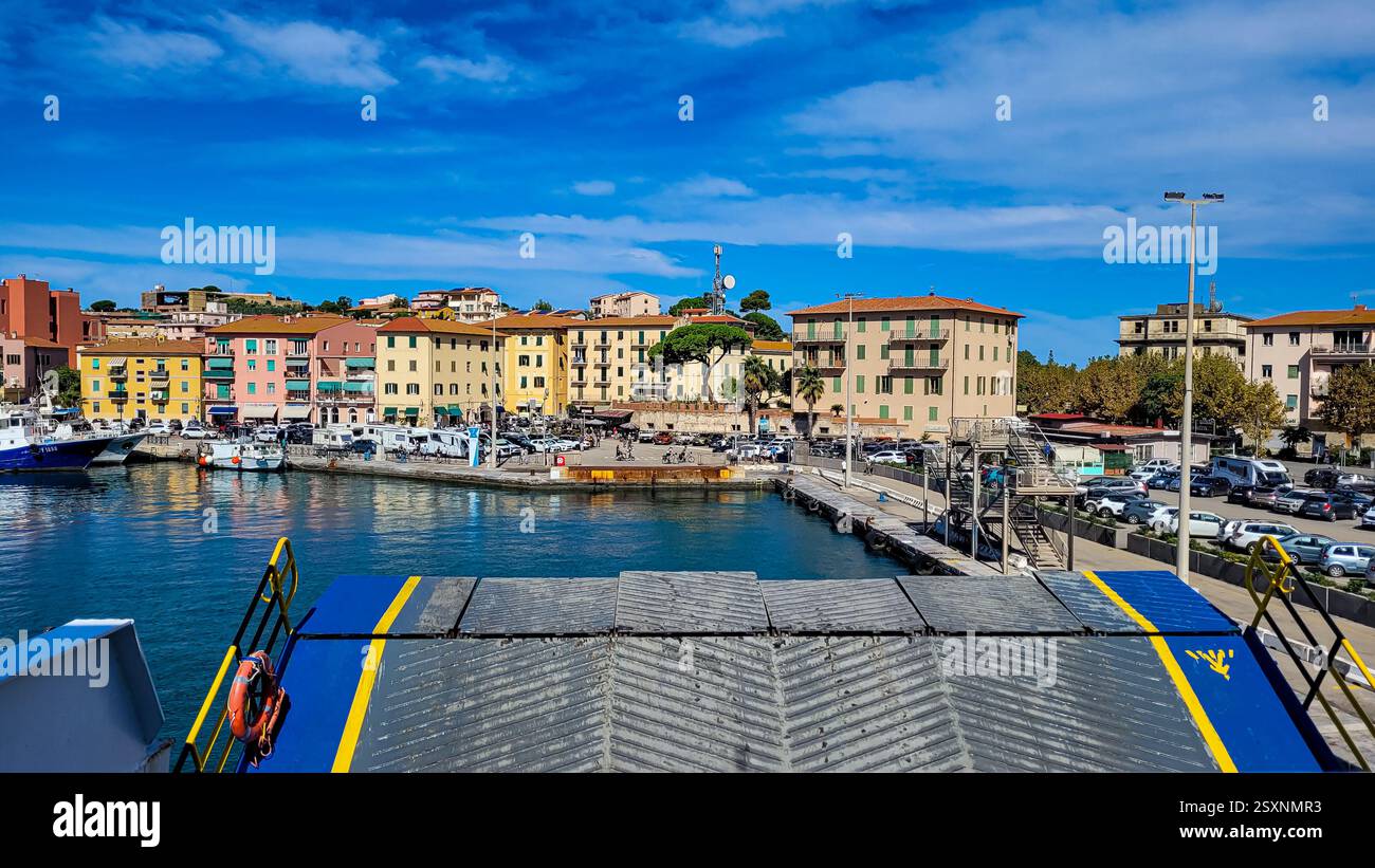 The mooring of the ferry in the port of the Italian city Portoferraio ...