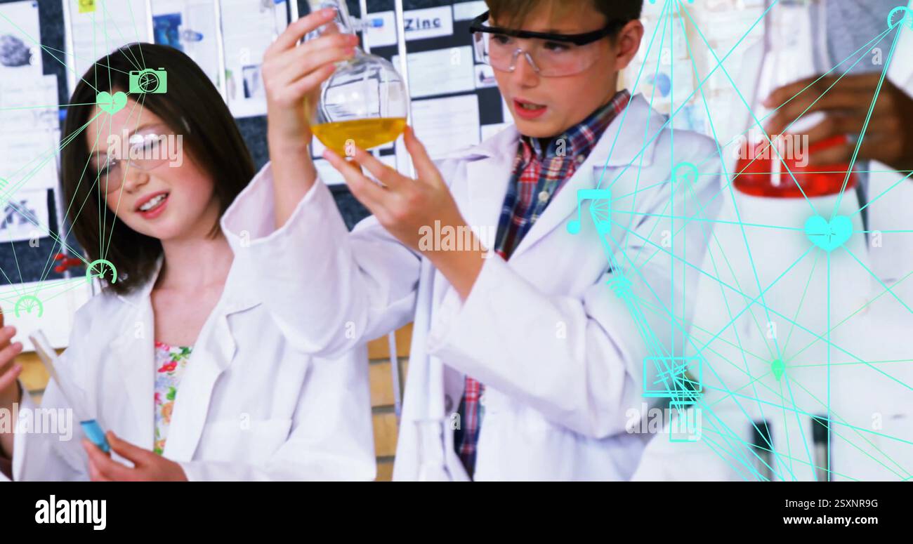 Students in lab coats conducting experiments with scientific data image ...