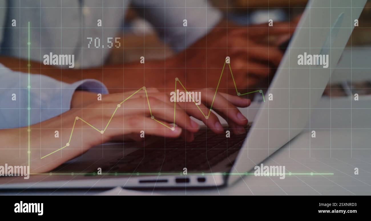 Typing on laptop, financial data graph image over hands Stock Photo - Alamy