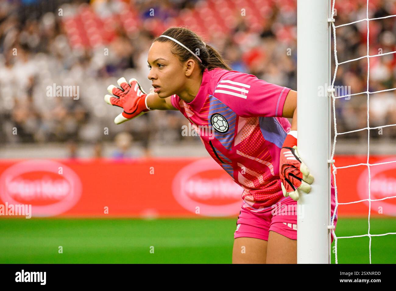 Colombia goalkeeper Luisa Agudelo (1) lines up her wall in the second ...