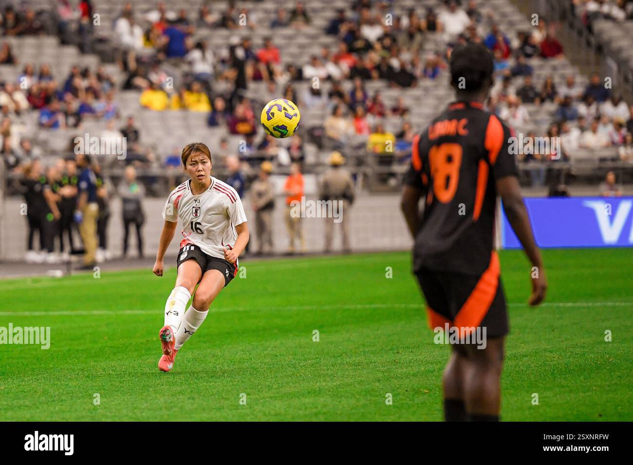 Japan midfielder Momoko Tanikawa (16) passes the ball in the second ...