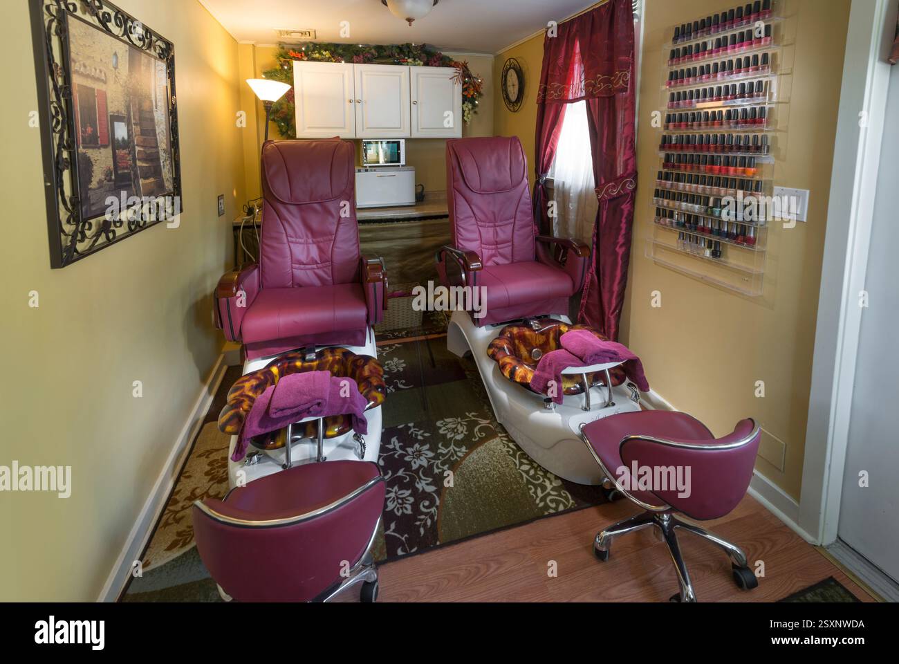Pedicure chairs in beauty salon, Pennsylvania USA Stock Photo - Alamy