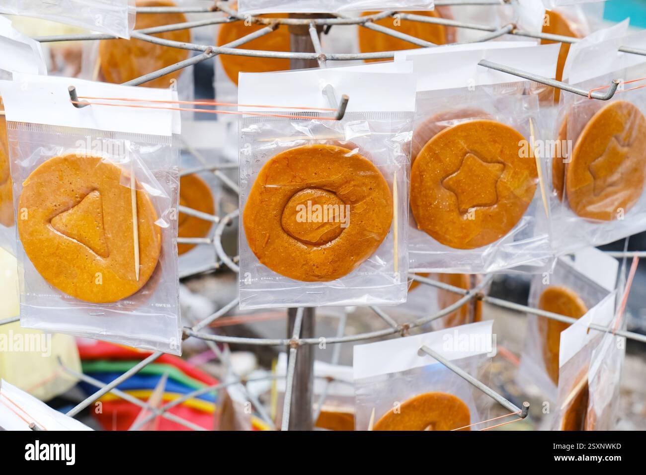 Artistic Dalgona Candy Shapes with symbols inside Stock Photo - Alamy