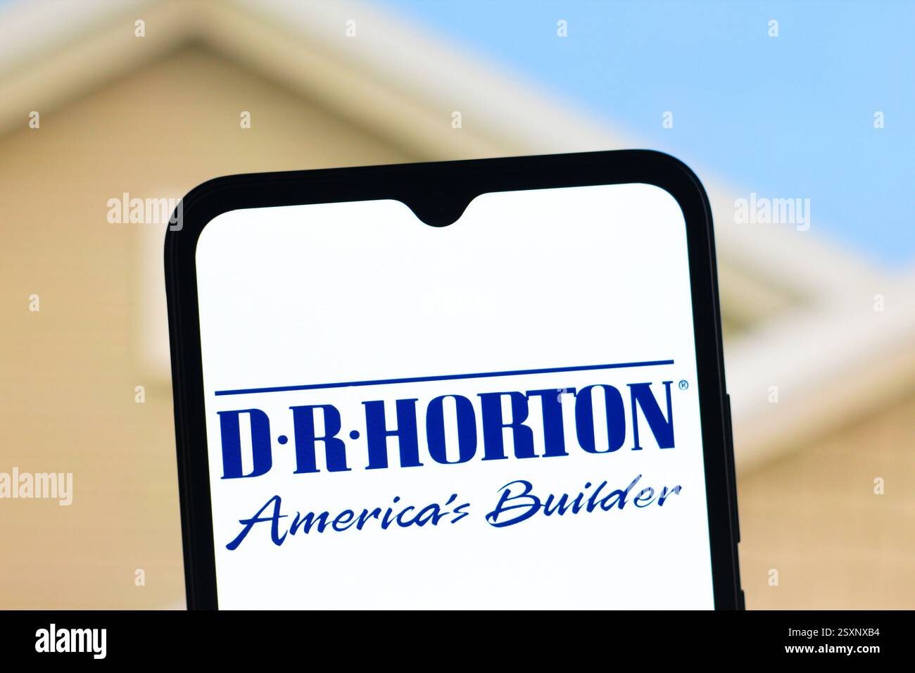 In this photo illustration, the DR Horton logo is seen displayed on a ...