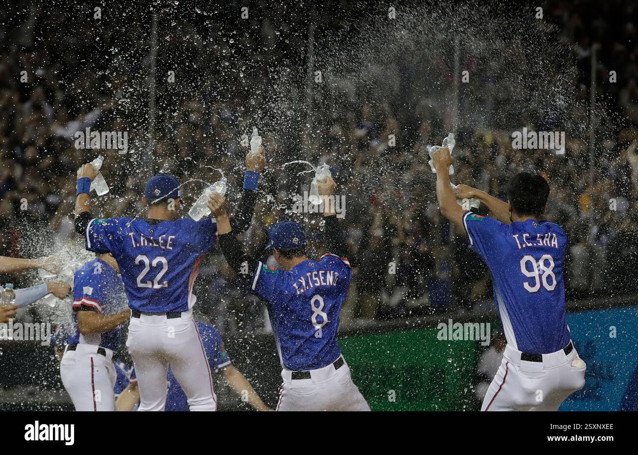 Team Taiwan celebrates after winning the World Baseball Classic ...
