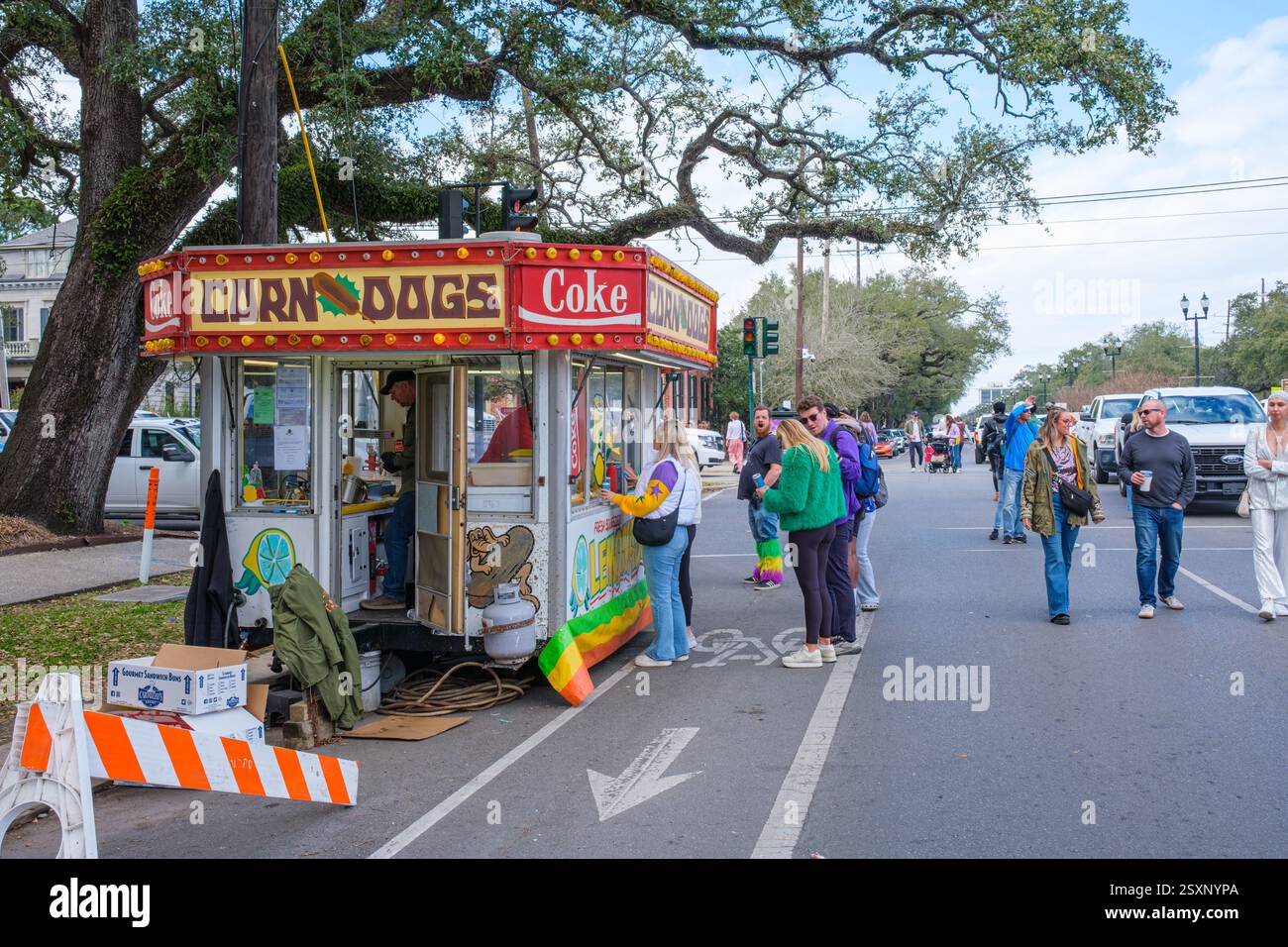 New Orleans, LA, USA - February 22, 2025: Paradegoers ordering food a ...