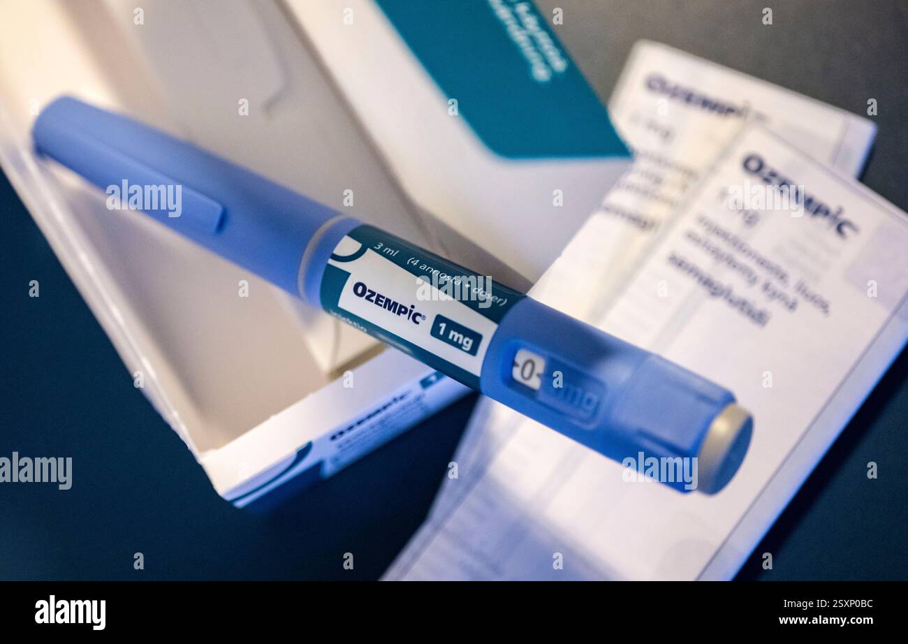 A package of Ozempic injection solution and injection pen with four ...