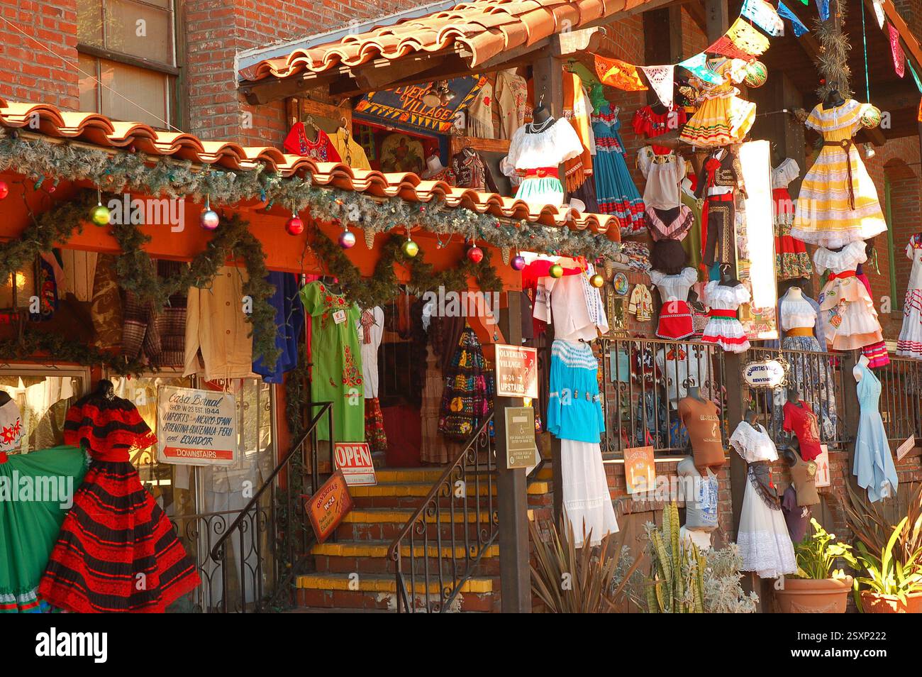 Traditional Mexican styled clothes are for sale at an El Pueblo Market ...