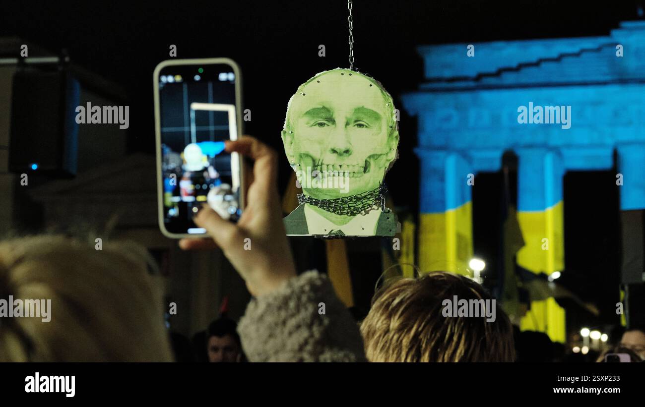 24 February 2025, Berlin: A caricature of Russian President Putin in ...