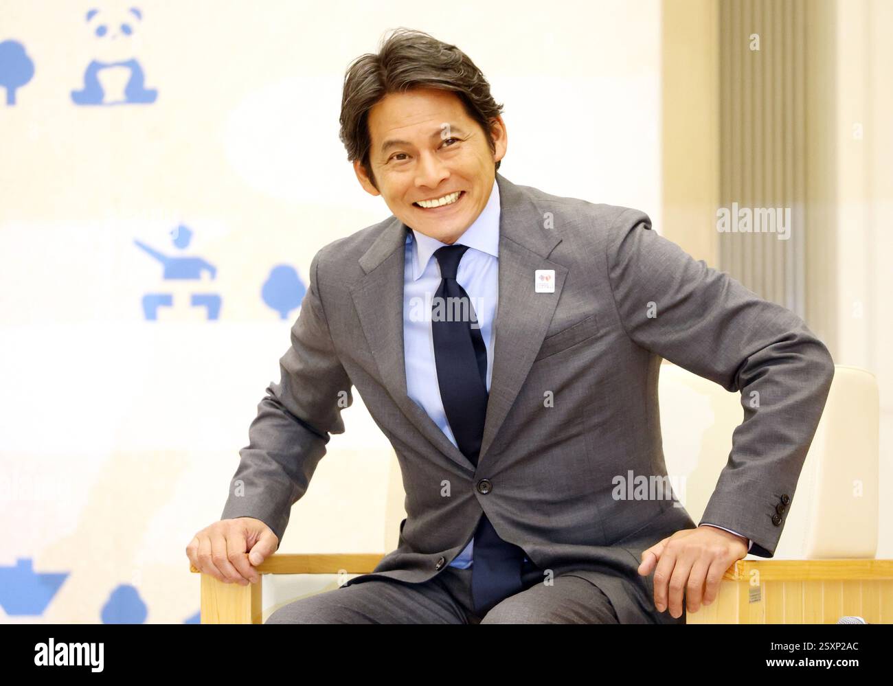 Tokyo, Japan. 25th Feb, 2025. Japanese actor Yuji Oda accompanied by the official mascot of the ...