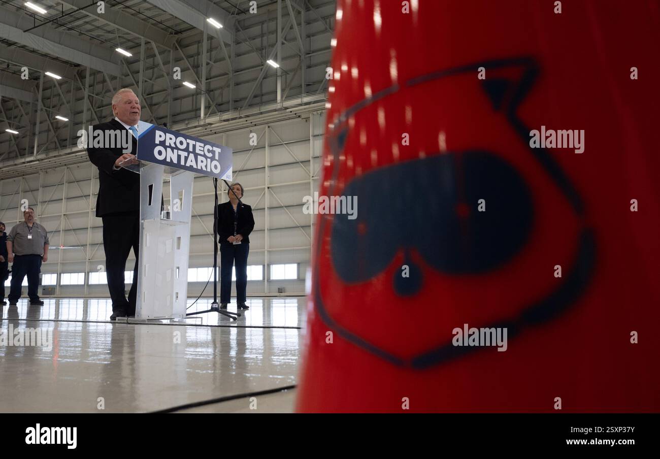 Ontario PC leader Doug Ford speaks with reporters during a campaign ...
