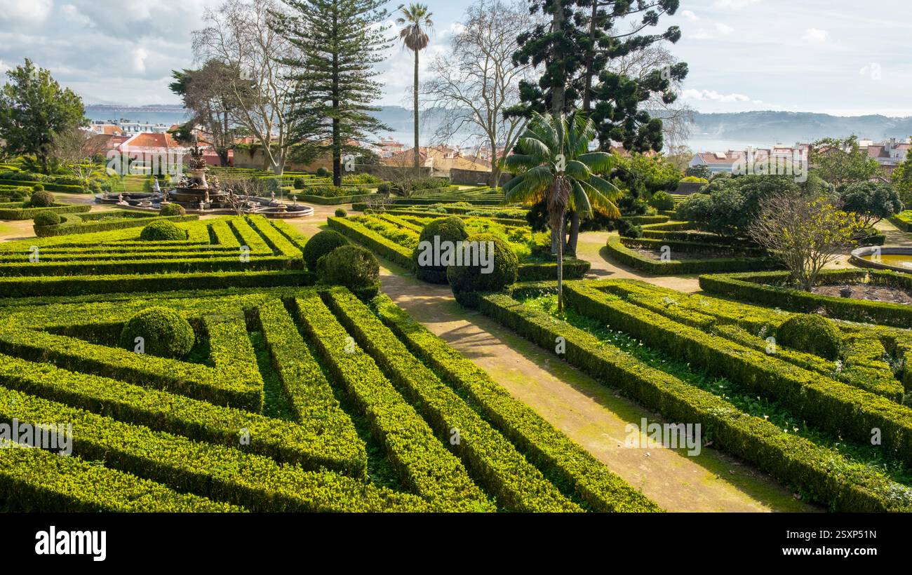 A view over topiary hedge and the Fountain of Forty Jets to the Tejo ...