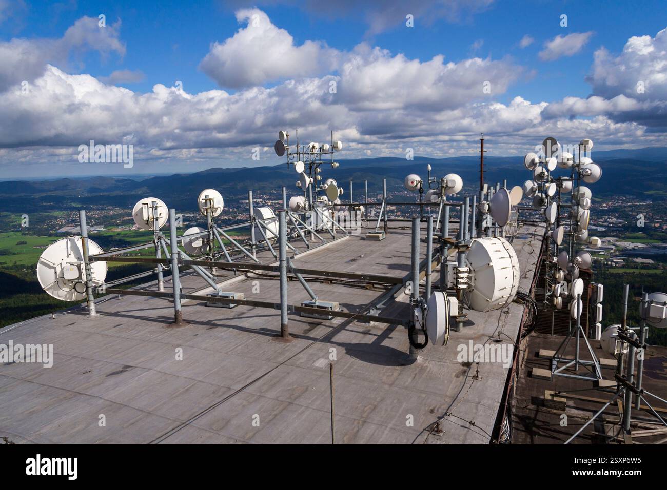 Bunch of transmitters and aerials on telecommunication tower Stock Photo - Alamy