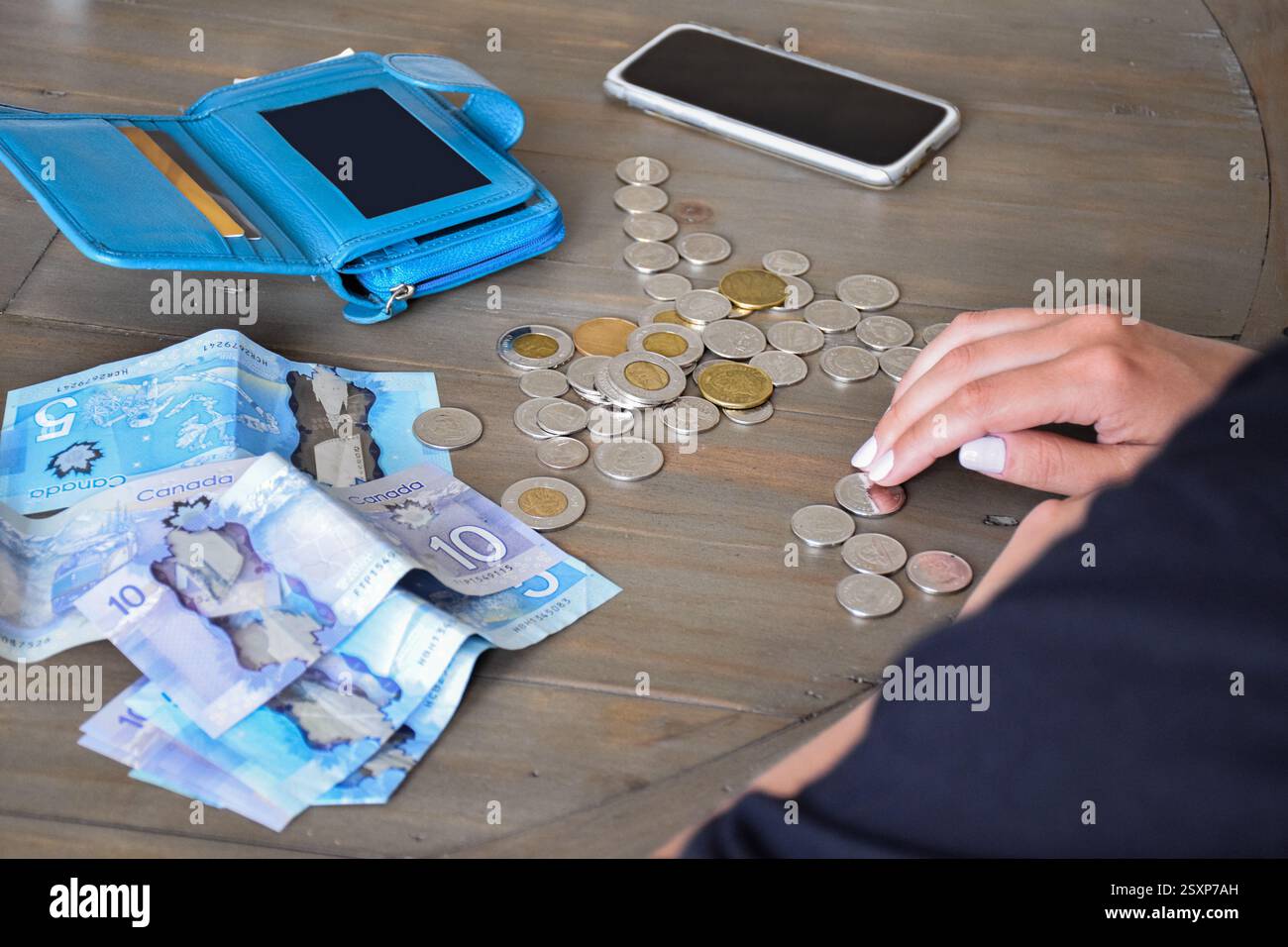 Canadian currency woman hi-res stock photography and images - Alamy