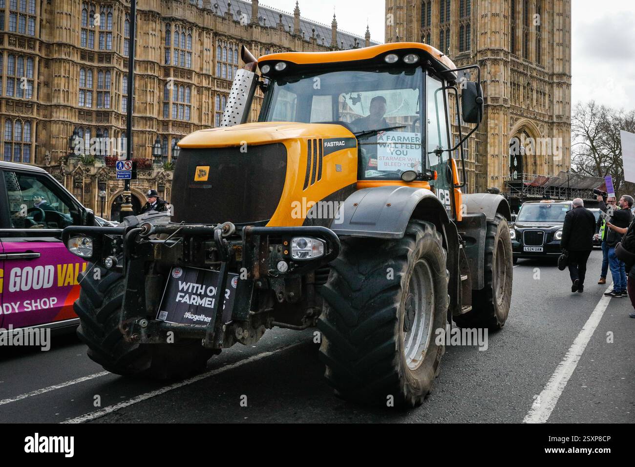 London, UK. 25th Feb, 2025. A tractor on its way to the centre. Farmers ...