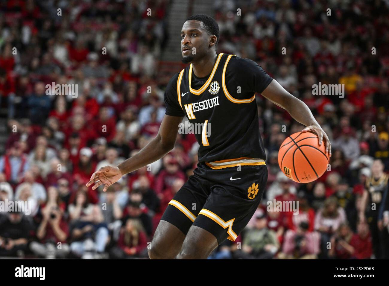 Missouri guard Marques Warrick (1) runs a play against Arkansas during ...
