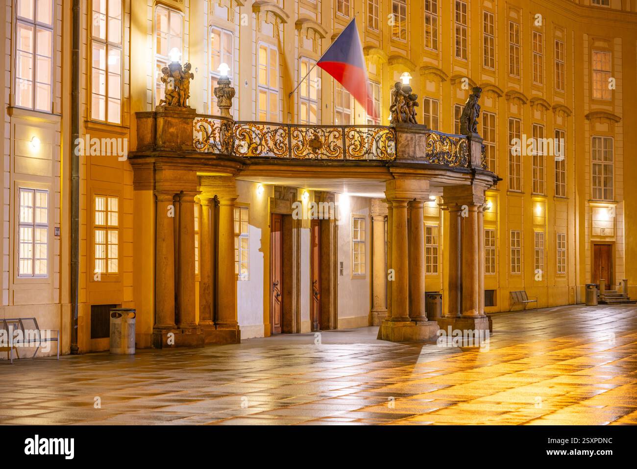 The entrance door to Prague Castle features a balcony adorned with ...