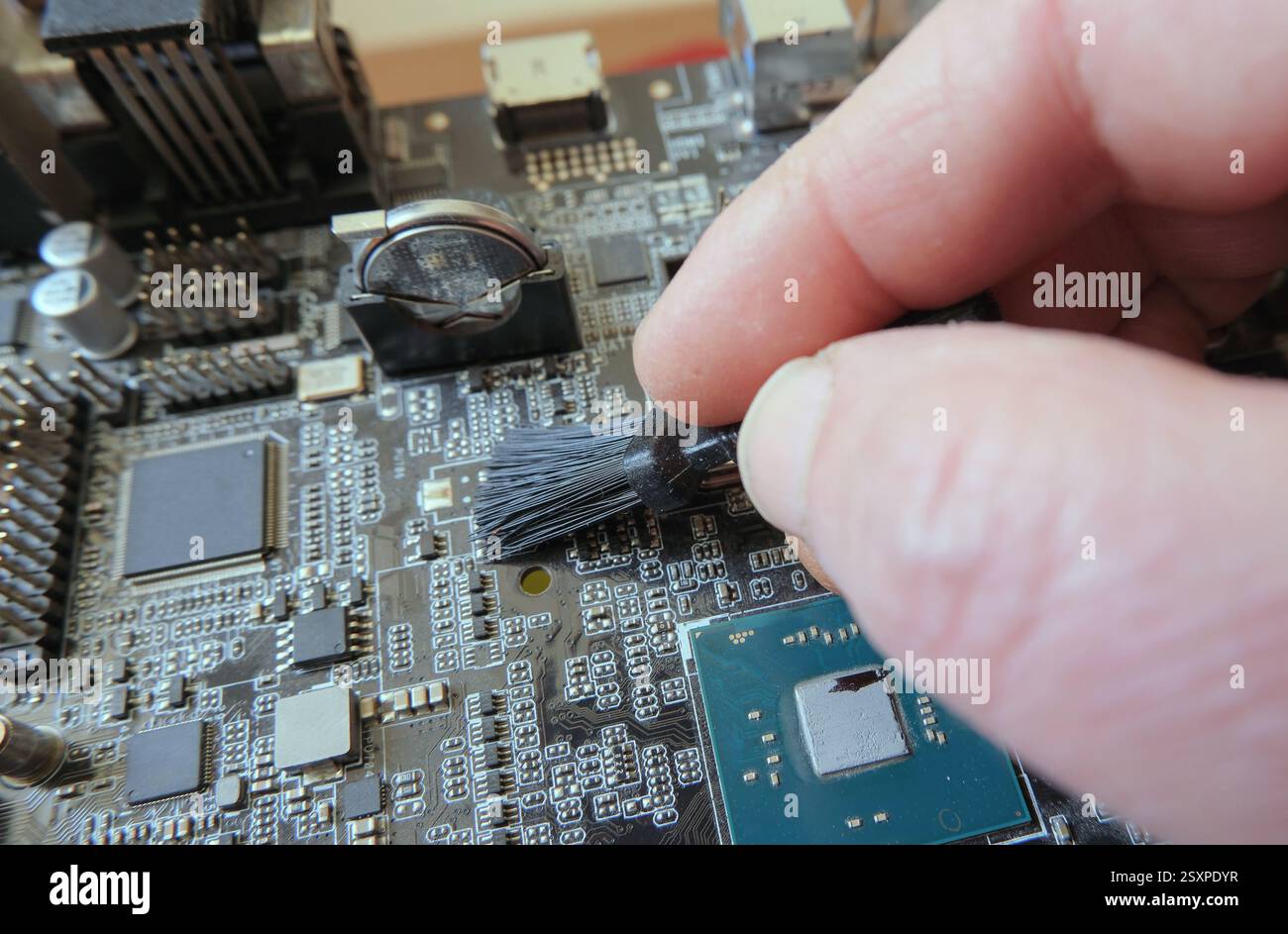 Maintenance of electronic circuit board with microchips. High ...