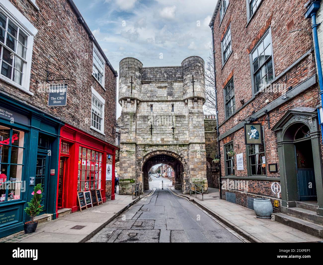 The image is of medieval York with its Tudor buildings headed by the ...