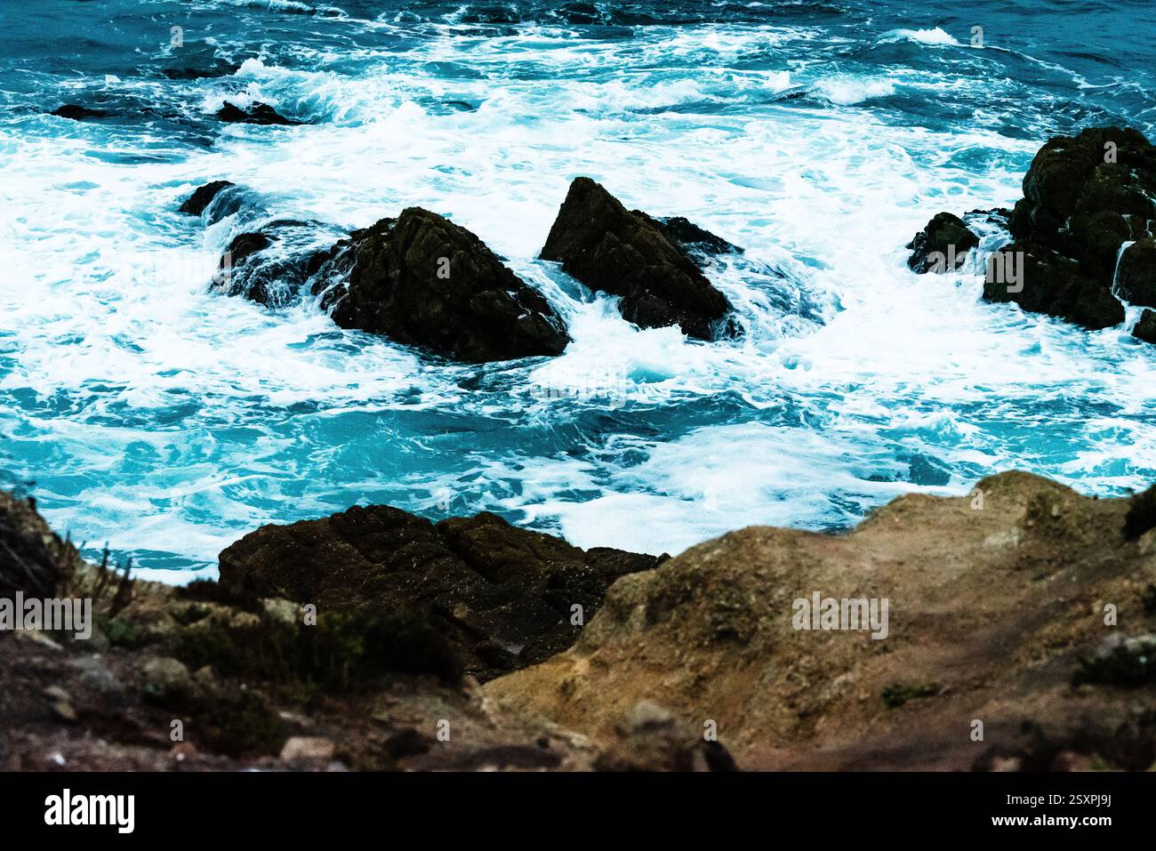 Rocky coastline and deep blue ocean at Big Sur, California Stock Photo ...