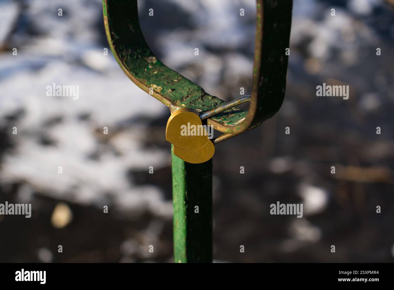 Iron, old handrails with a lock on them. Love lock on the railing. High ...