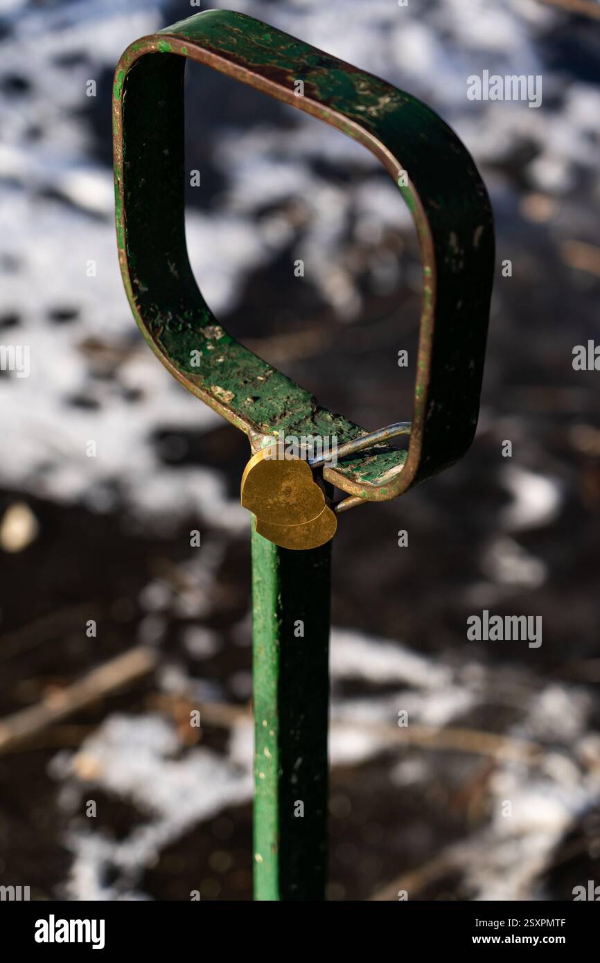 Iron, old handrails with a lock on them. Love lock on the railing. High ...