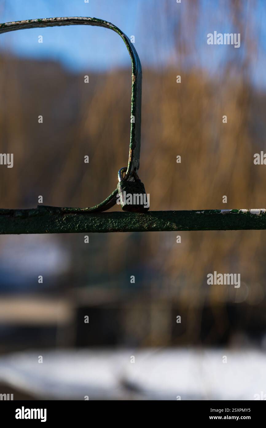 Iron, old handrails with a lock on them. Love lock on the railing. High ...