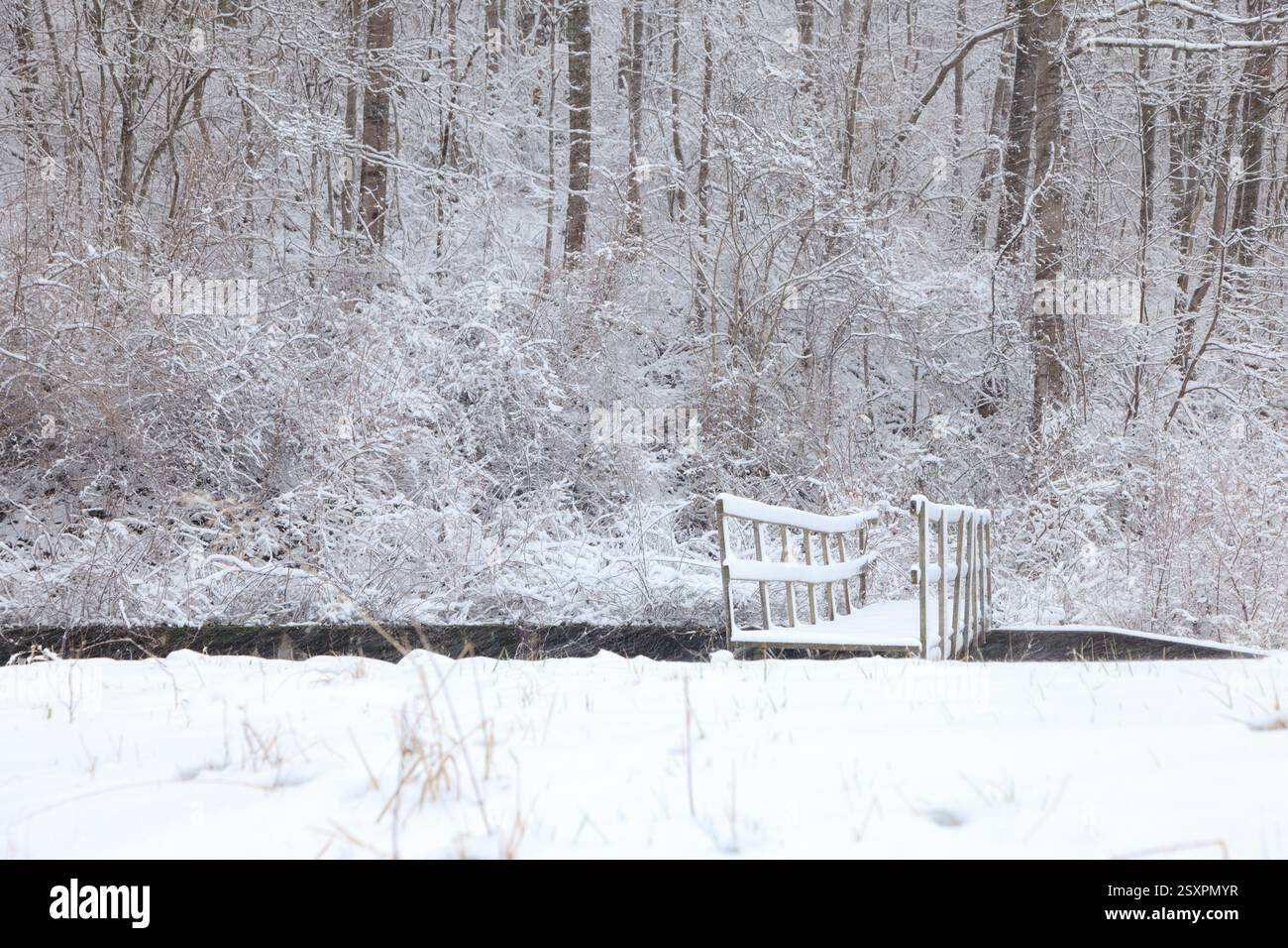 Snow covered bridge landscape scene in winter Stock Photo - Alamy
