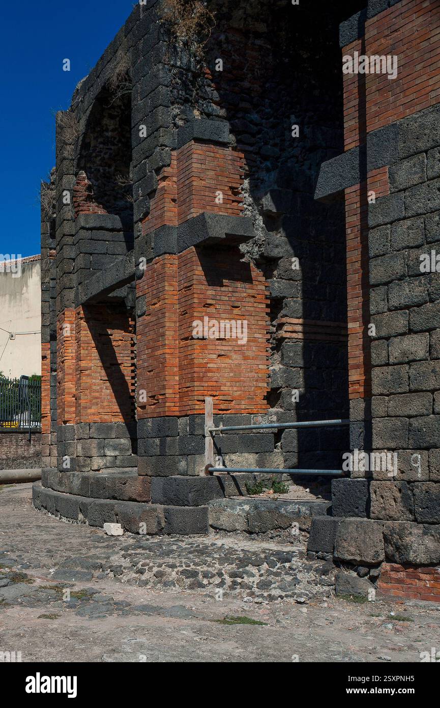Orange bricks and blocks of volcanic basalt lava stone from Mount Etna ...