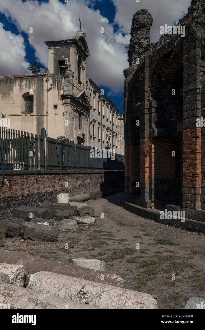 Broken marble columns lie in the walkway or ambulacrum beside the outer ...