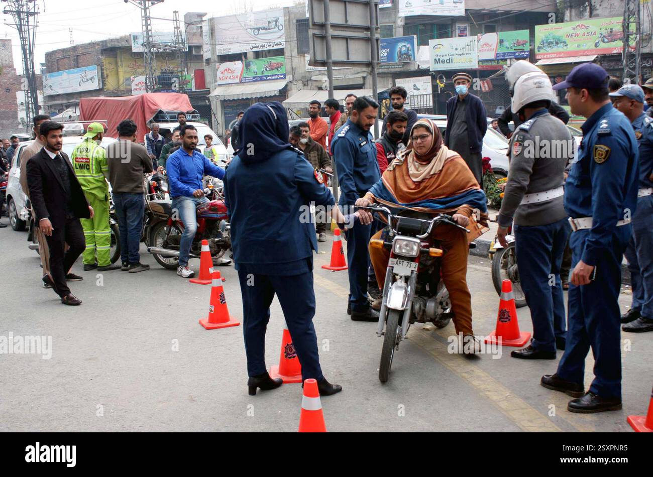 Traffic wardens create awareness about helmet and traffic rule among ...