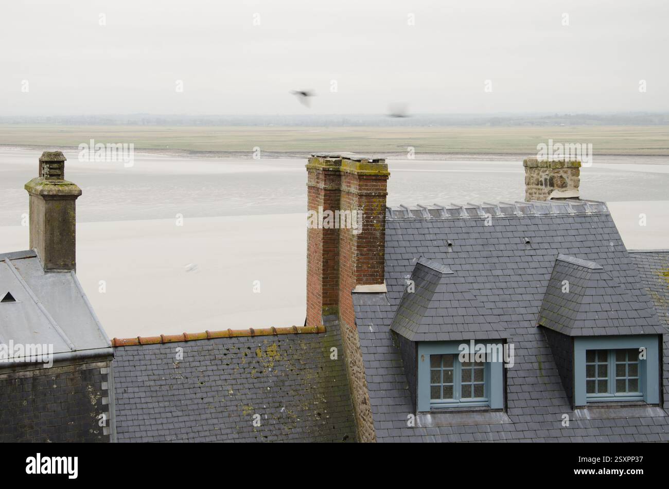 December 12, 2024: Normandy: House in the Mont-Saint-Michel and its bay ...