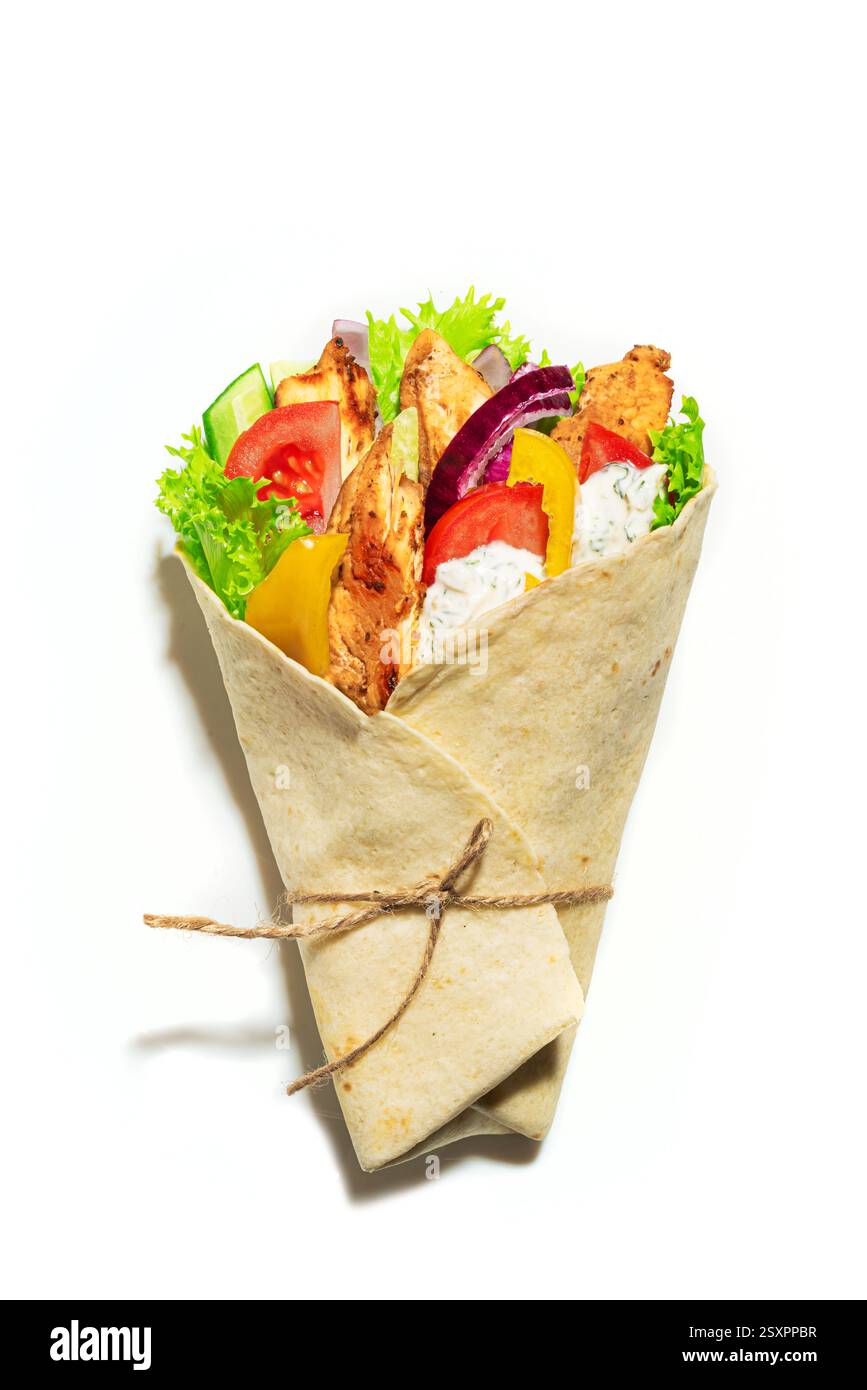 Greek chicken gyros wrap with vegetables and tzatziki sauce isolated on ...