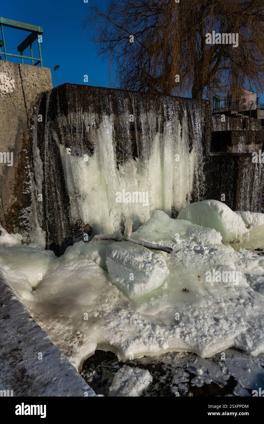 Frozen waterfall water. A frozen waterfall on a February morning Stock ...