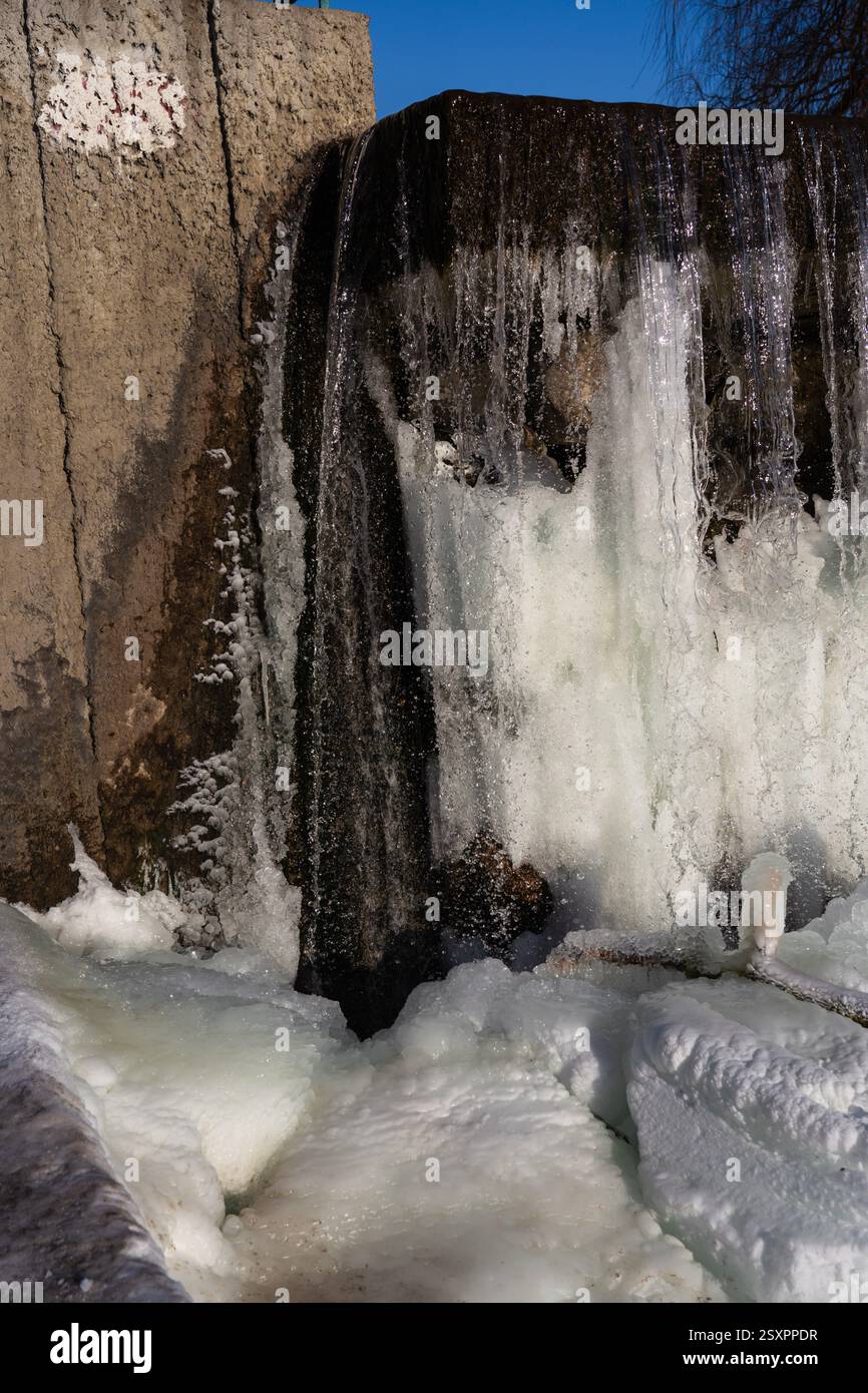 Frozen waterfall water. A frozen waterfall on a February morning Stock ...